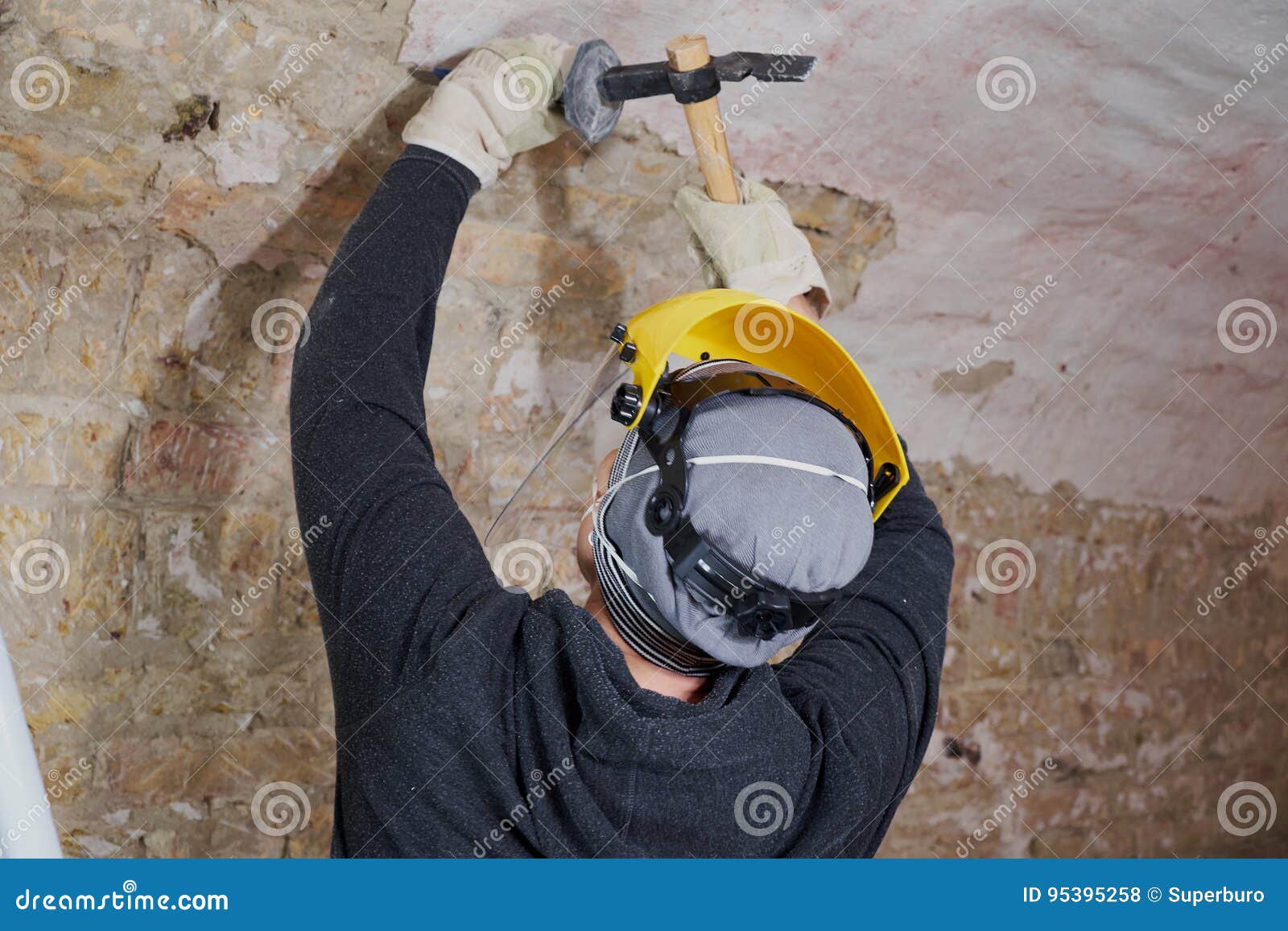 Worker Removing Plaster from the Wall with Tools Stock Photo - Image of ...