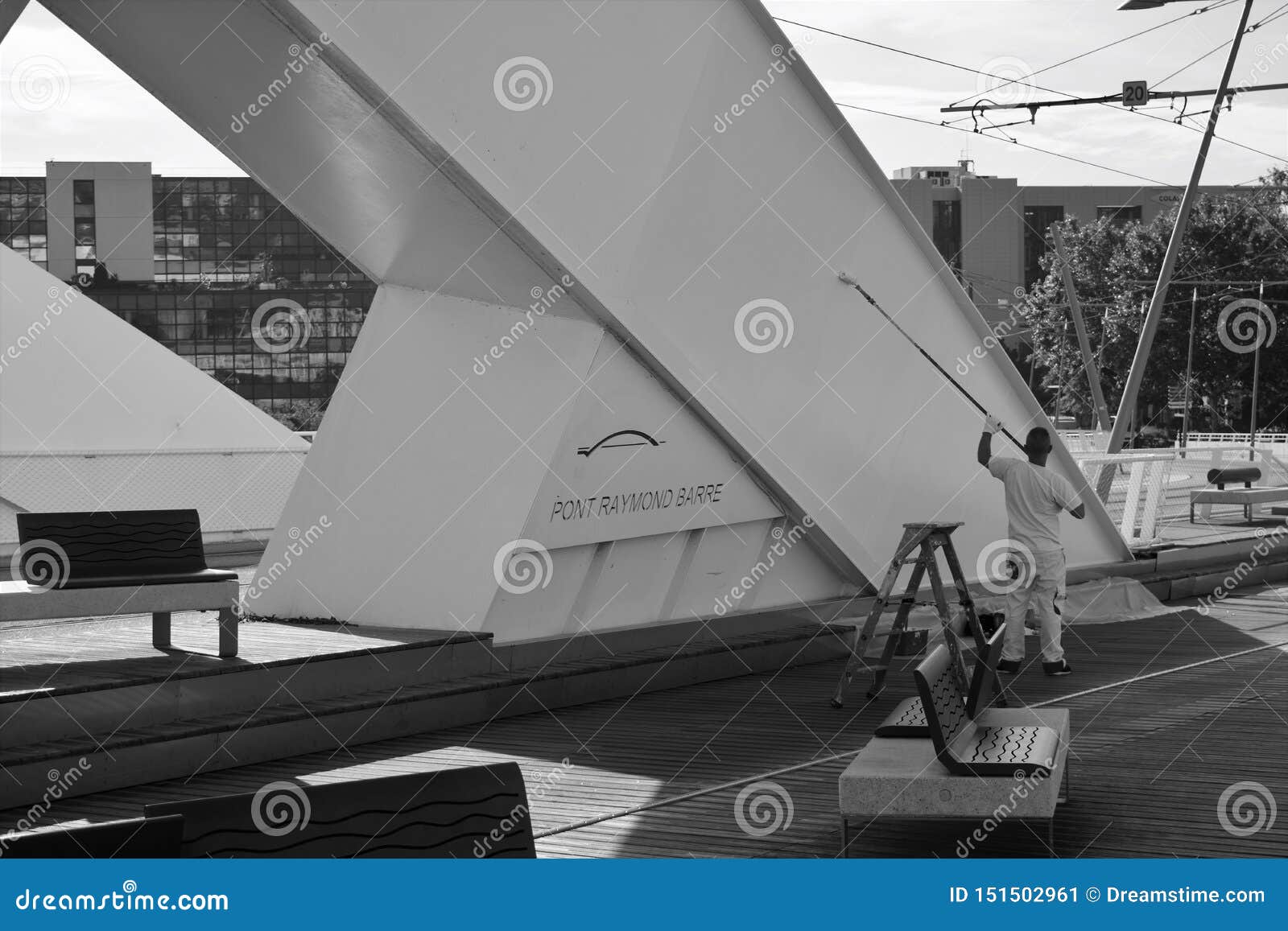 A worker repaints a bridge editorial photo. Image of roller - 151502961