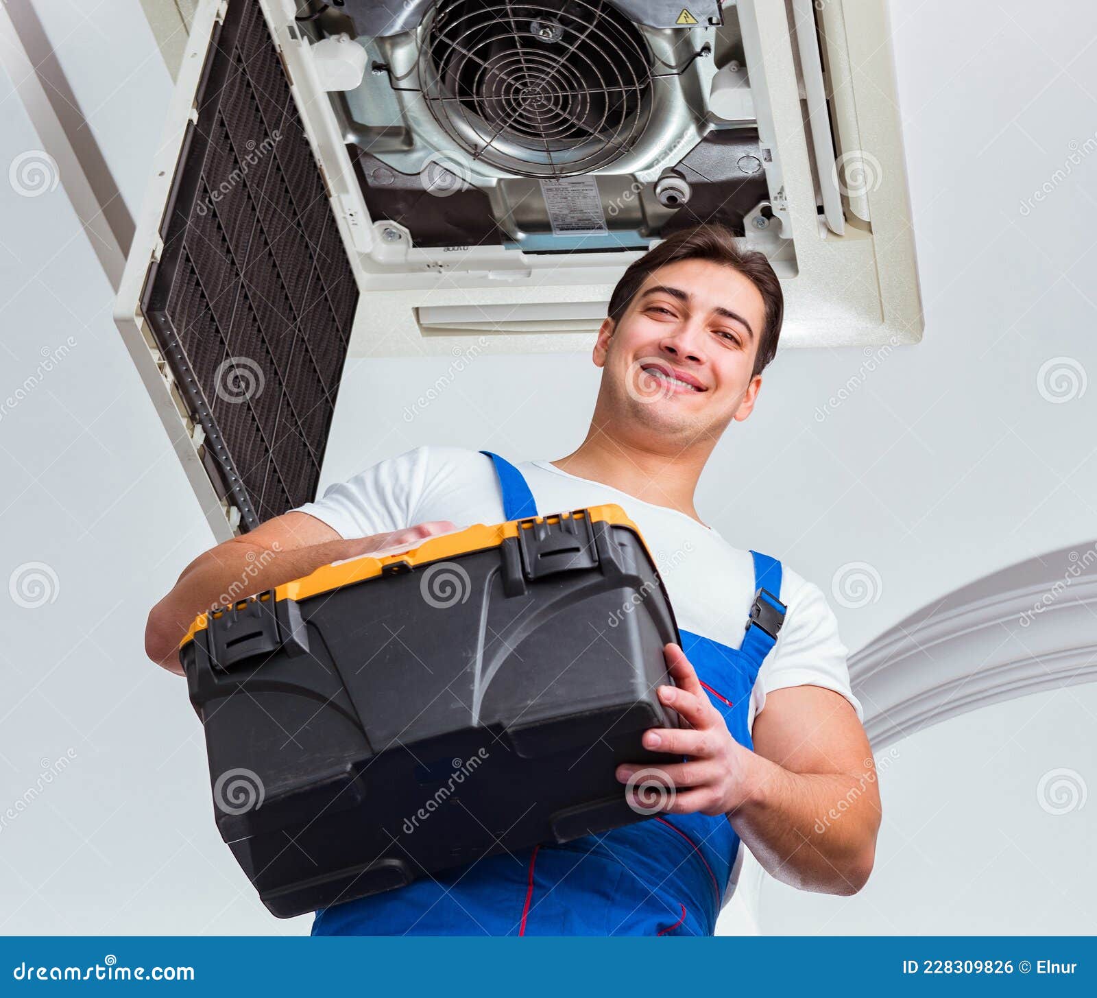 Worker Repairing Ceiling Air Conditioning Unit Stock Photo - Image of ...