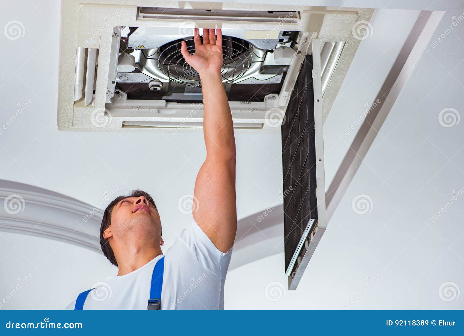 The Worker Repairing Ceiling Air Conditioning Unit Stock Image - Image ...