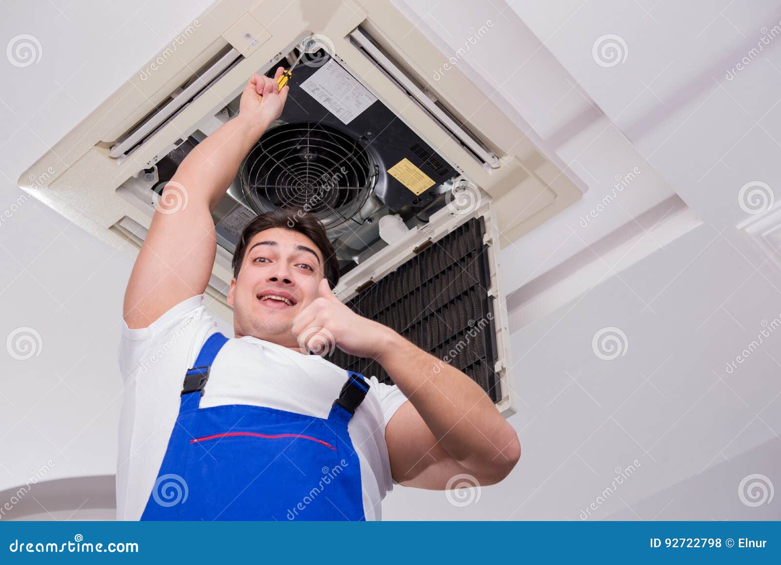 The Worker Repairing Ceiling Air Conditioning Unit Stock Photo - Image ...