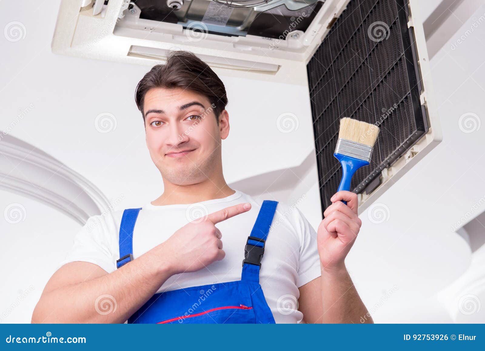 The Worker Repairing Ceiling Air Conditioning Unit Stock Photo - Image ...