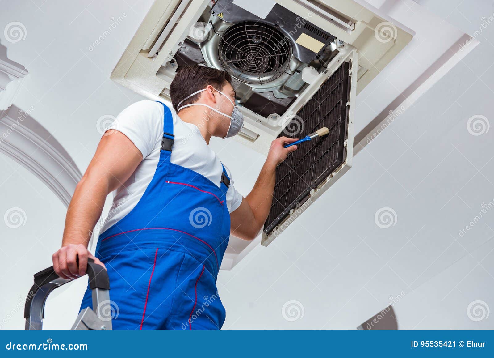 The Worker Repairing Ceiling Air Conditioning Unit Stock Image - Image ...