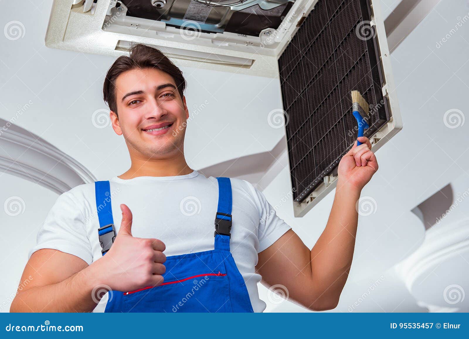 The Worker Repairing Ceiling Air Conditioning Unit Stock Image - Image ...