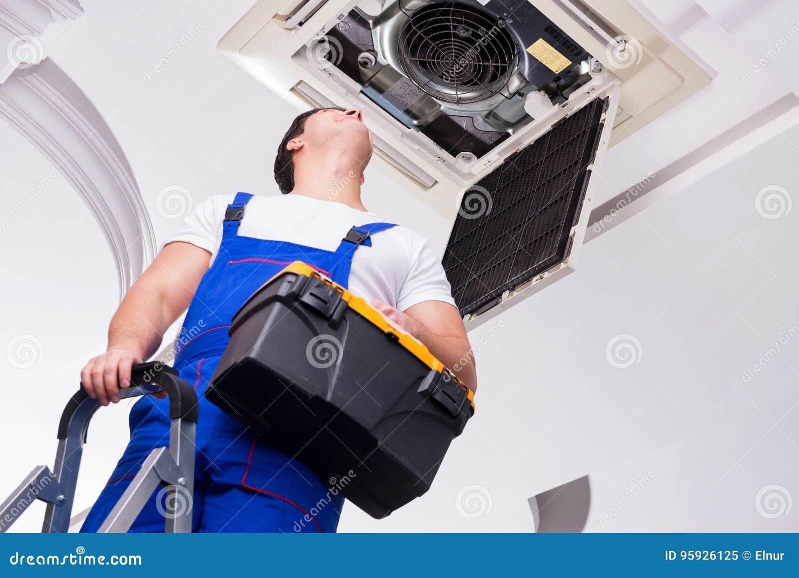 The Worker Repairing Ceiling Air Conditioning Unit Stock Image - Image ...