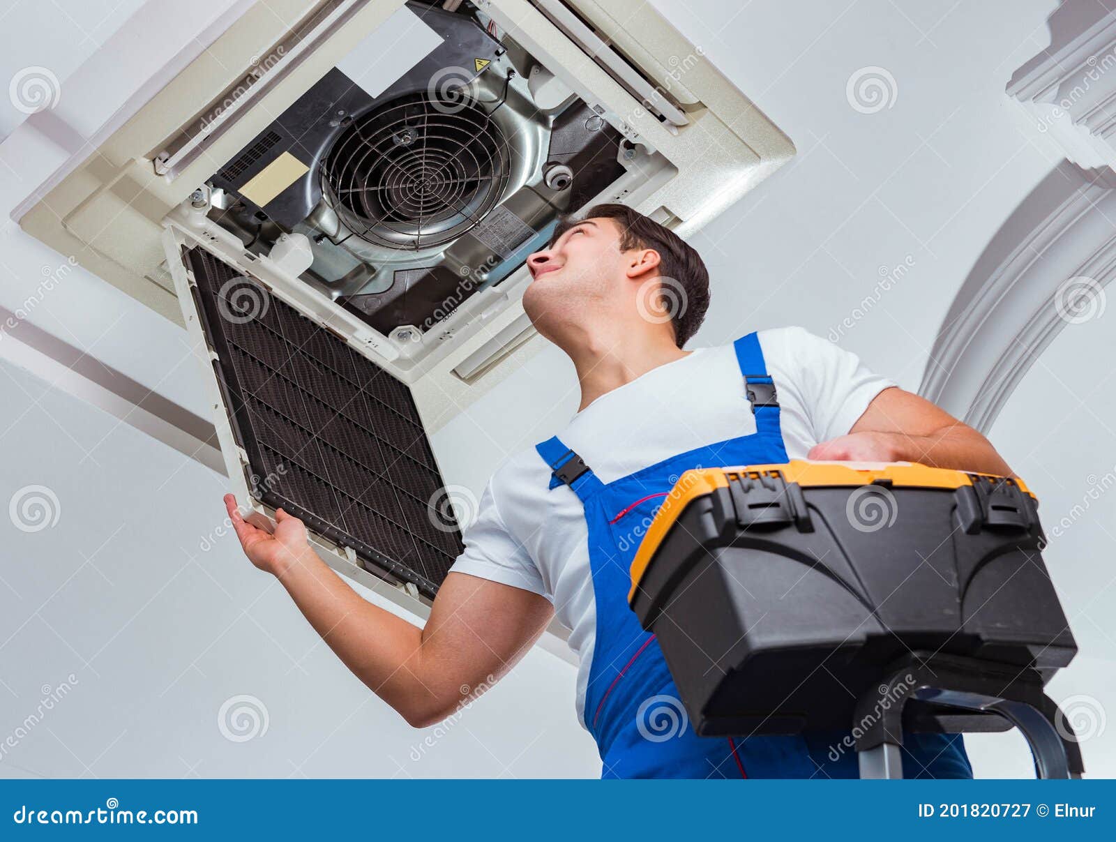 Worker Repairing Ceiling Air Conditioning Unit Stock Image - Image of ...