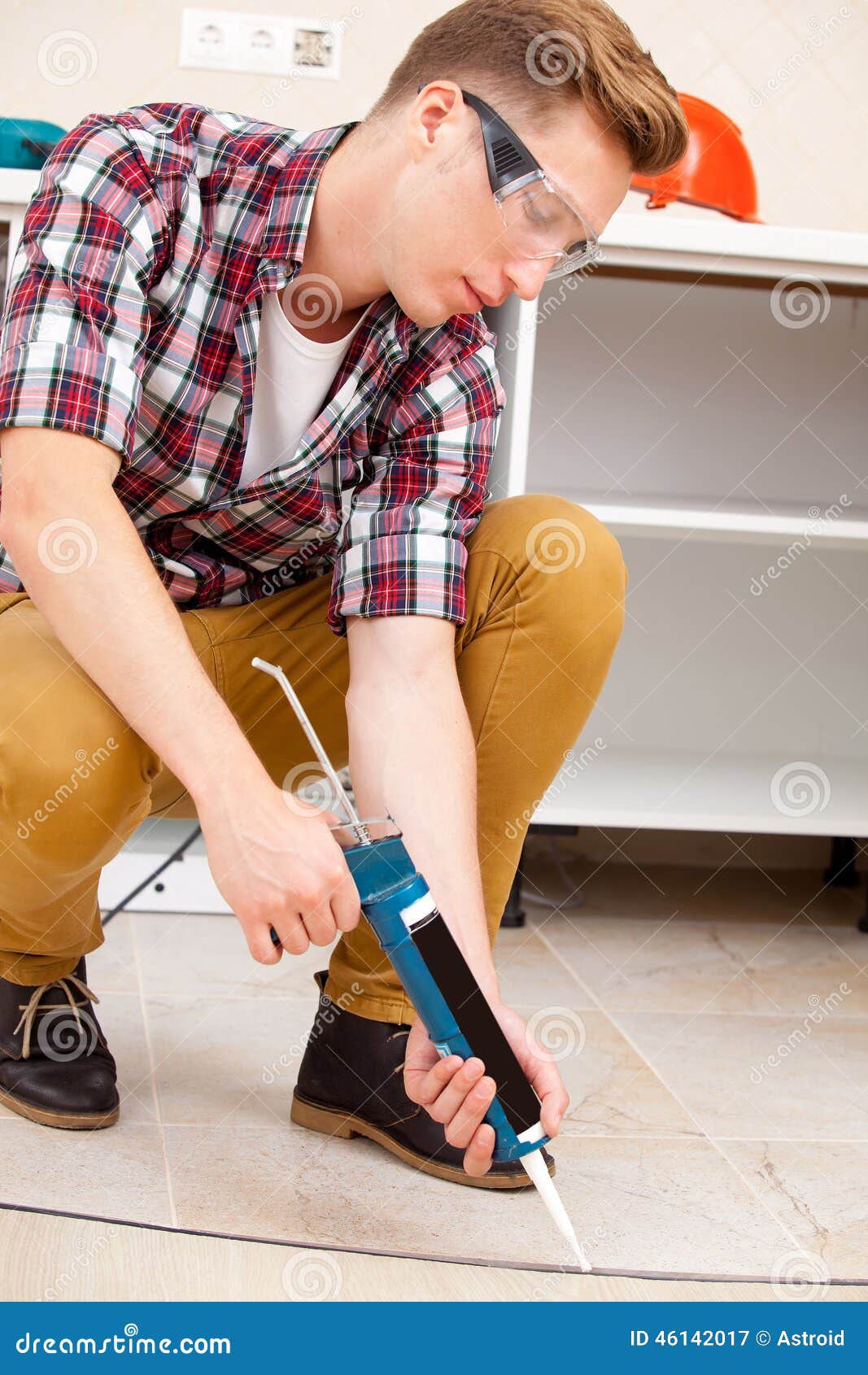 Worker repairing the floor stock image. Image of repairman - 46142017