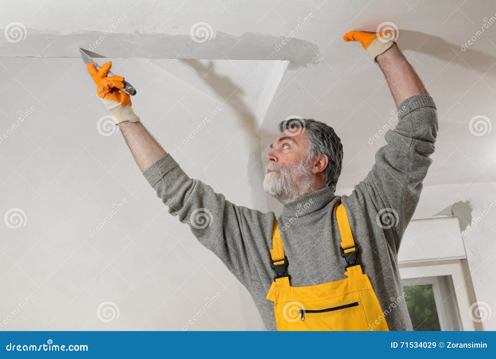 Worker Repairing Plaster at Ceiling Stock Image - Image of paint ...