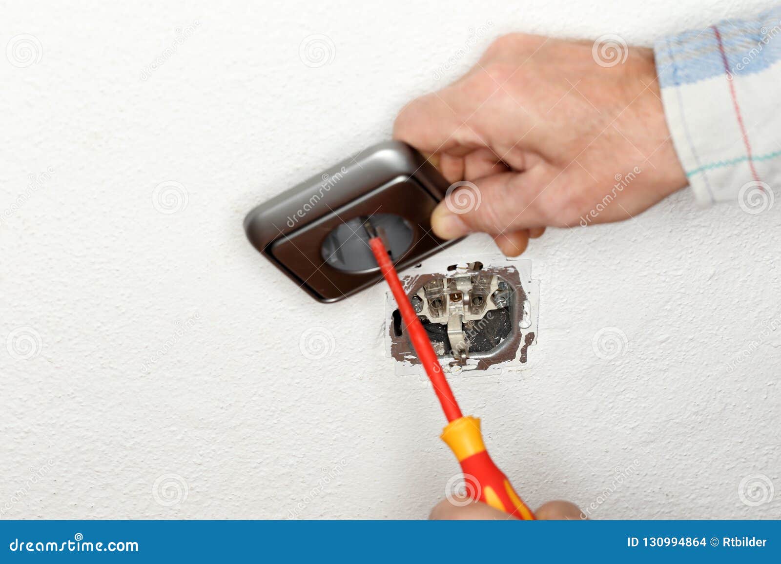 Worker is Repairing a Plug Socket Stock Photo - Image of background ...