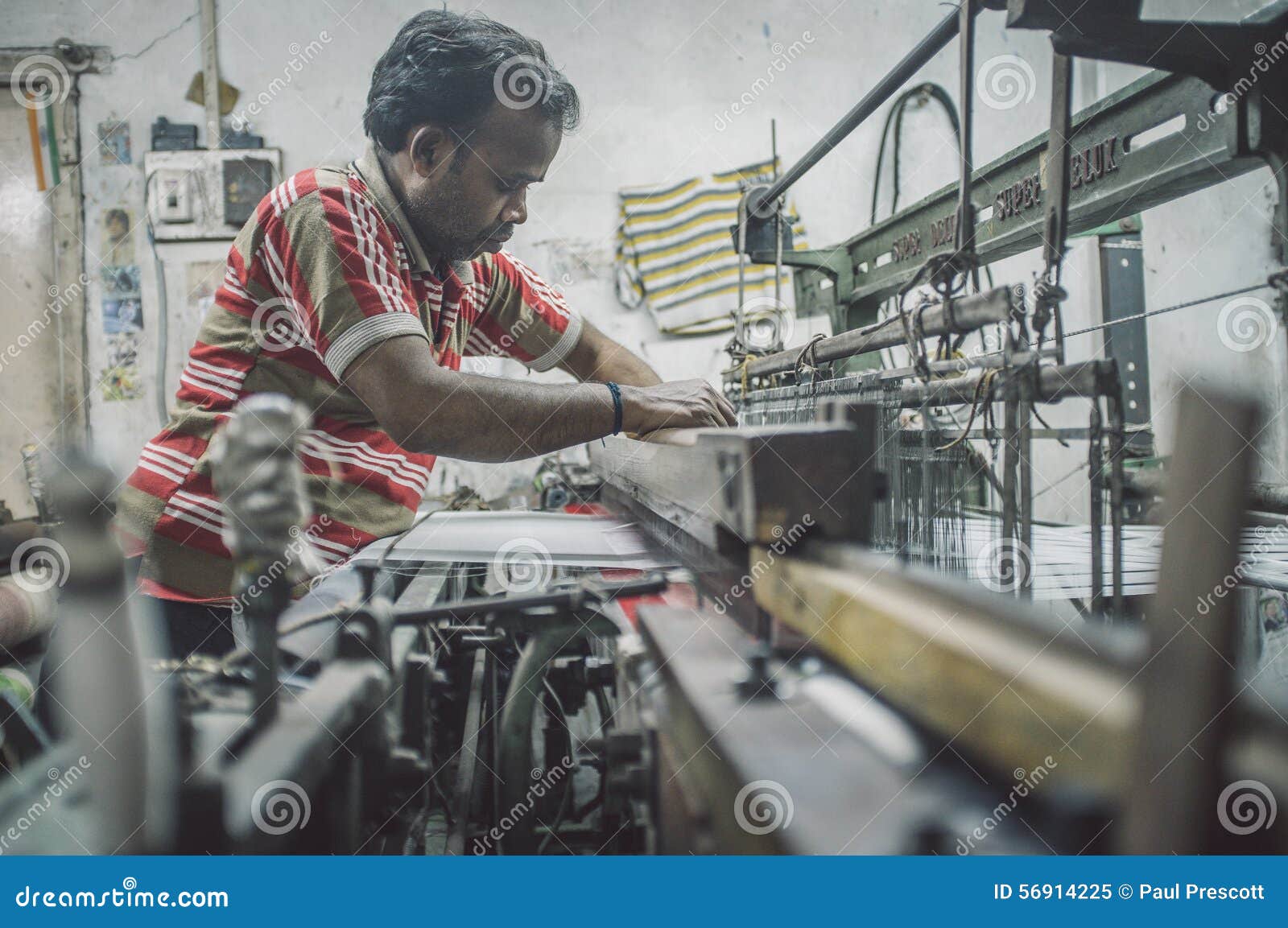 Worker repairs machine editorial image. Image of people - 56914225