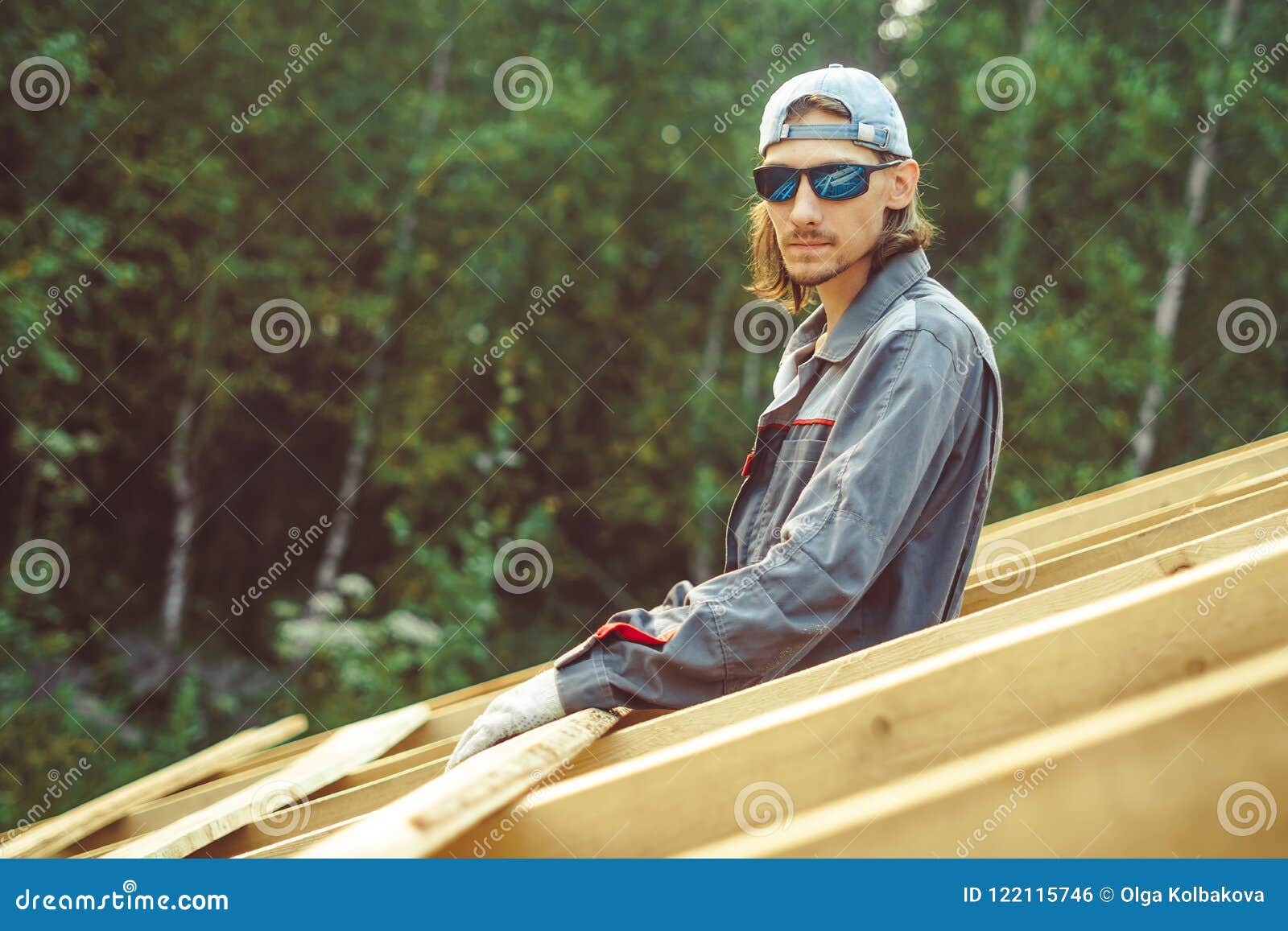 The Worker is Building the Roof Stock Photo - Image of beam, rafters ...