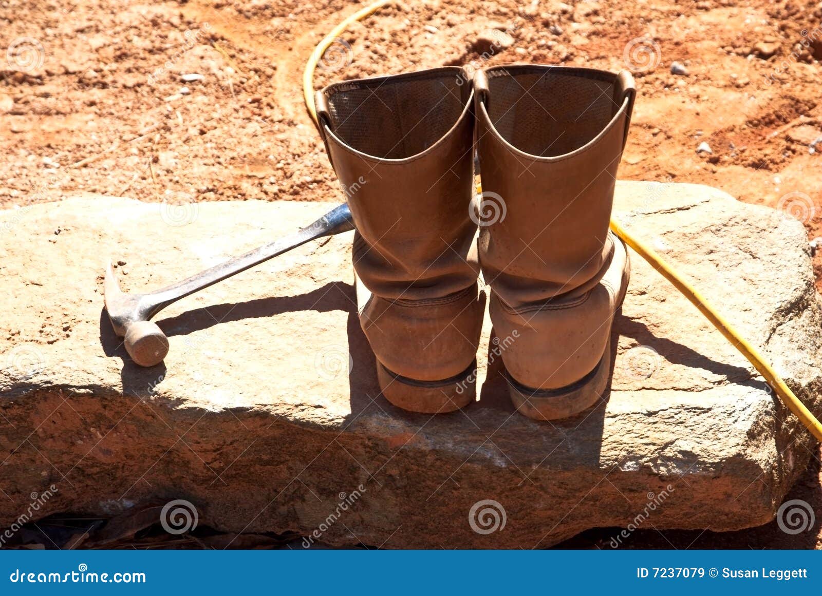 Worker s Boots and Hammer stock image. Image of build - 7237079