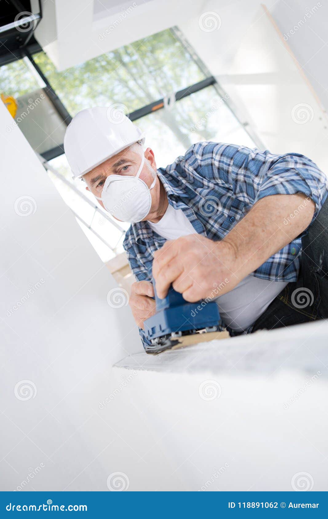 Worker is sanding wall stock photo. Image of dust, installation - 118891062