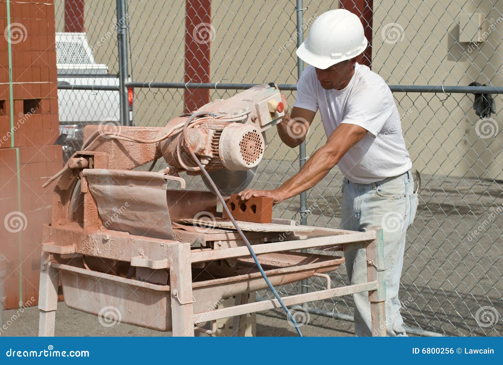 Worker Sawing Bricks stock photo. Image of masculine, labor - 6800256
