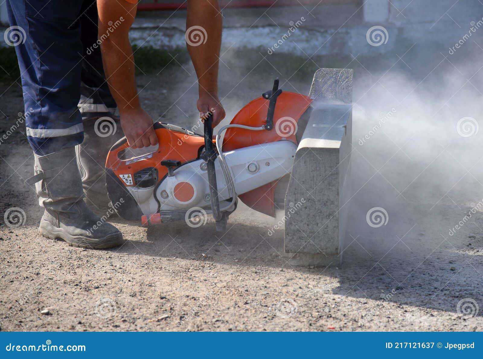 A Worker Saws a Concrete Curb with a Circular Saw. Stock Image - Image ... A Worker Saws a Concrete Curb with a Circular Saw. Stock Image - Image ...