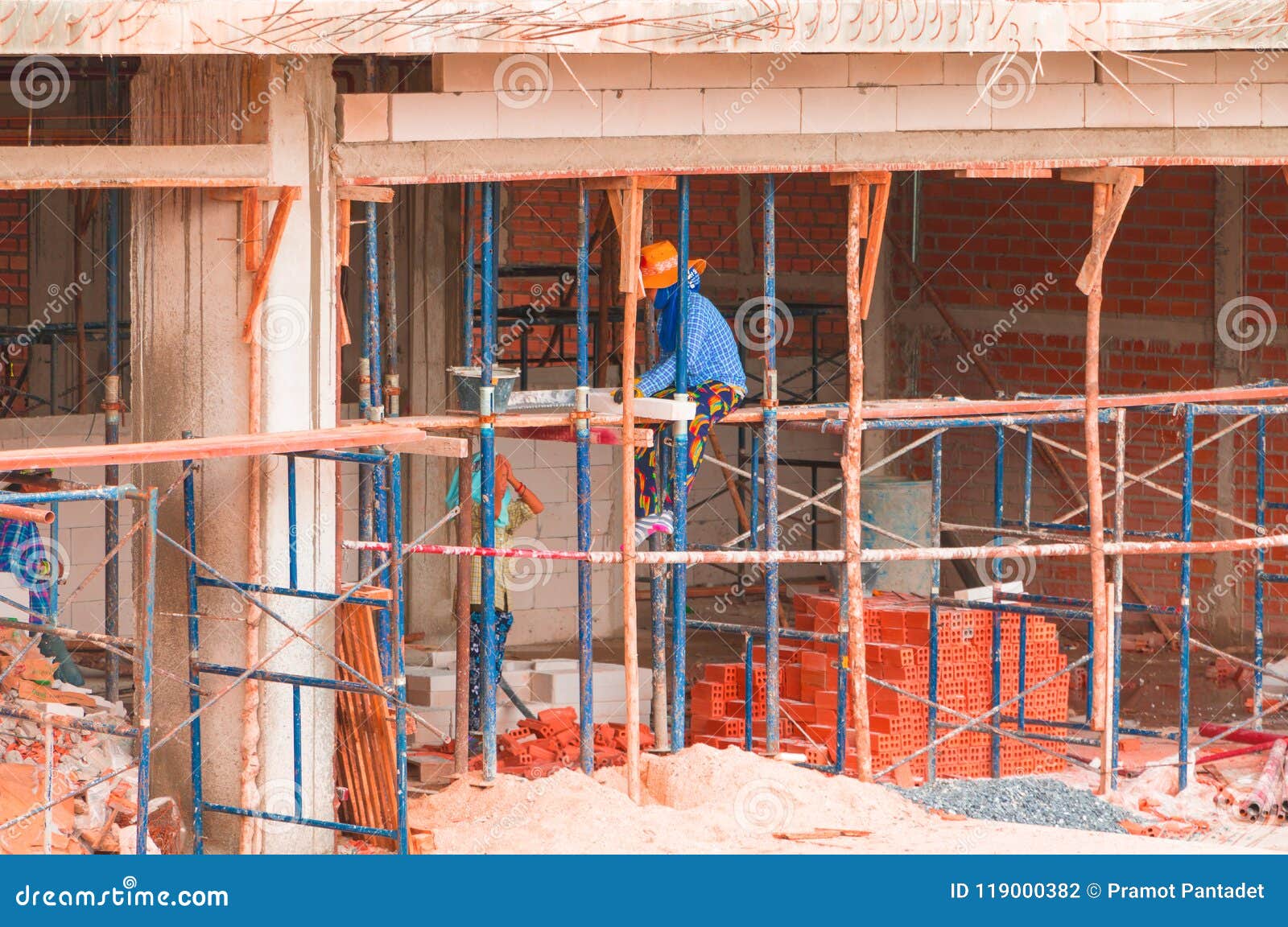 Worker on Scaffold in Construction Site Editorial Photography - Image ...