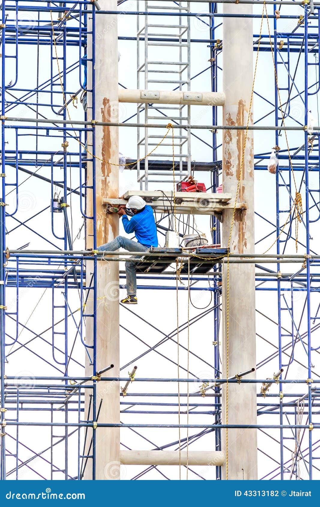 Worker On Scaffolding Working For Repair And Renovation Roof Of Temple ...