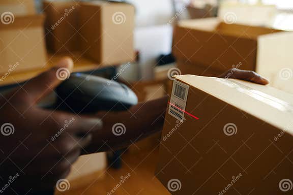Worker Scanning Barcode on Box Stock Photo - Image of table ...