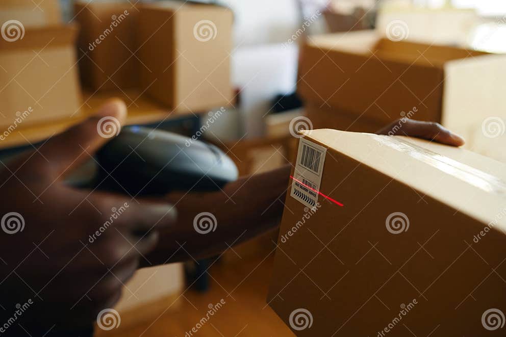 Worker Scanning Barcode on Box Stock Photo - Image of table ...
