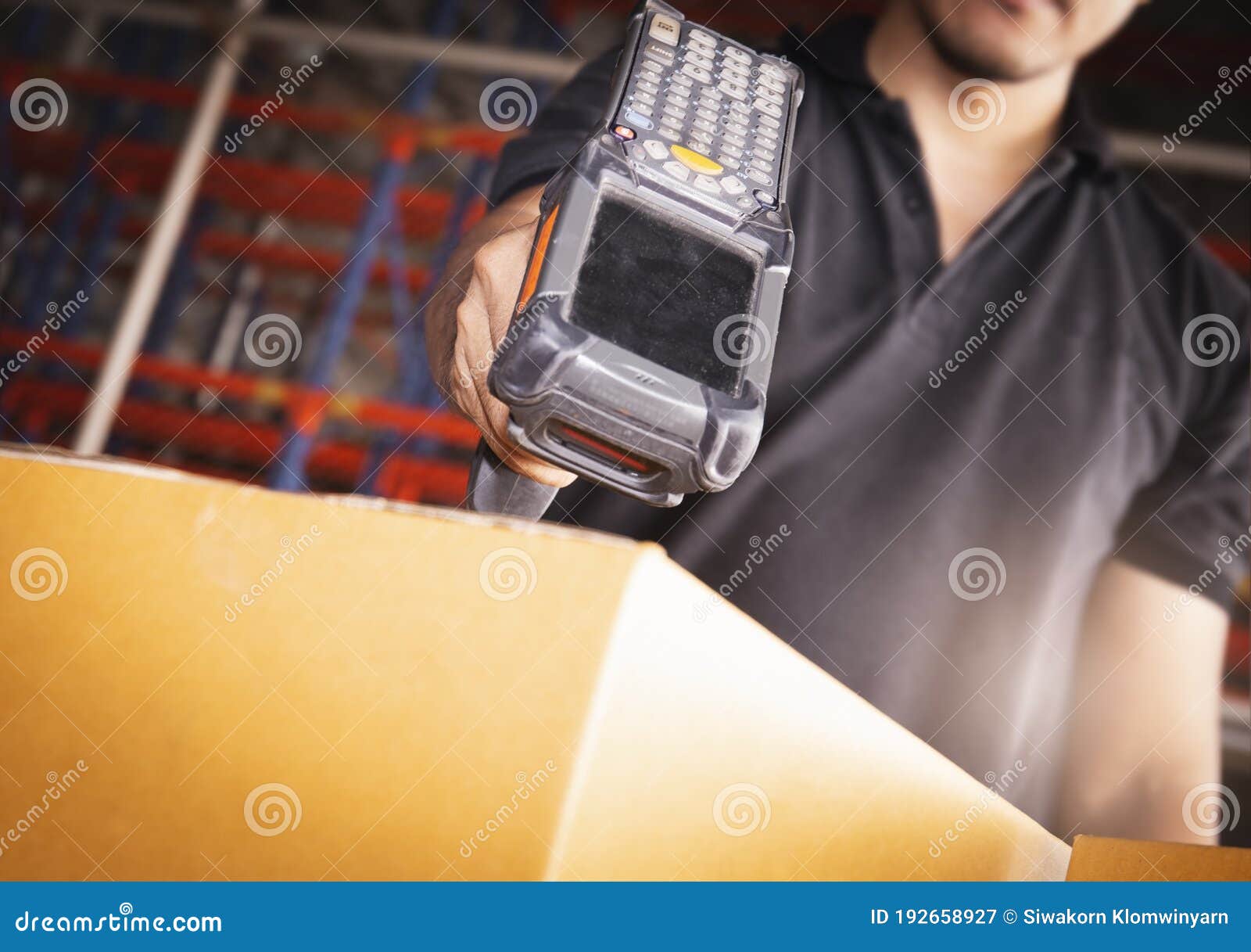 Worker Scanning Barcode Scanner with Red Laser on Parcel Box. Shipment ...