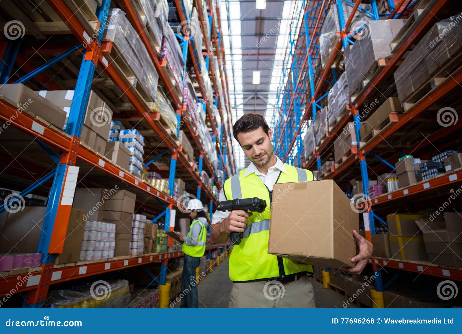 Worker scanning a box stock photo. Image of industry - 77696268