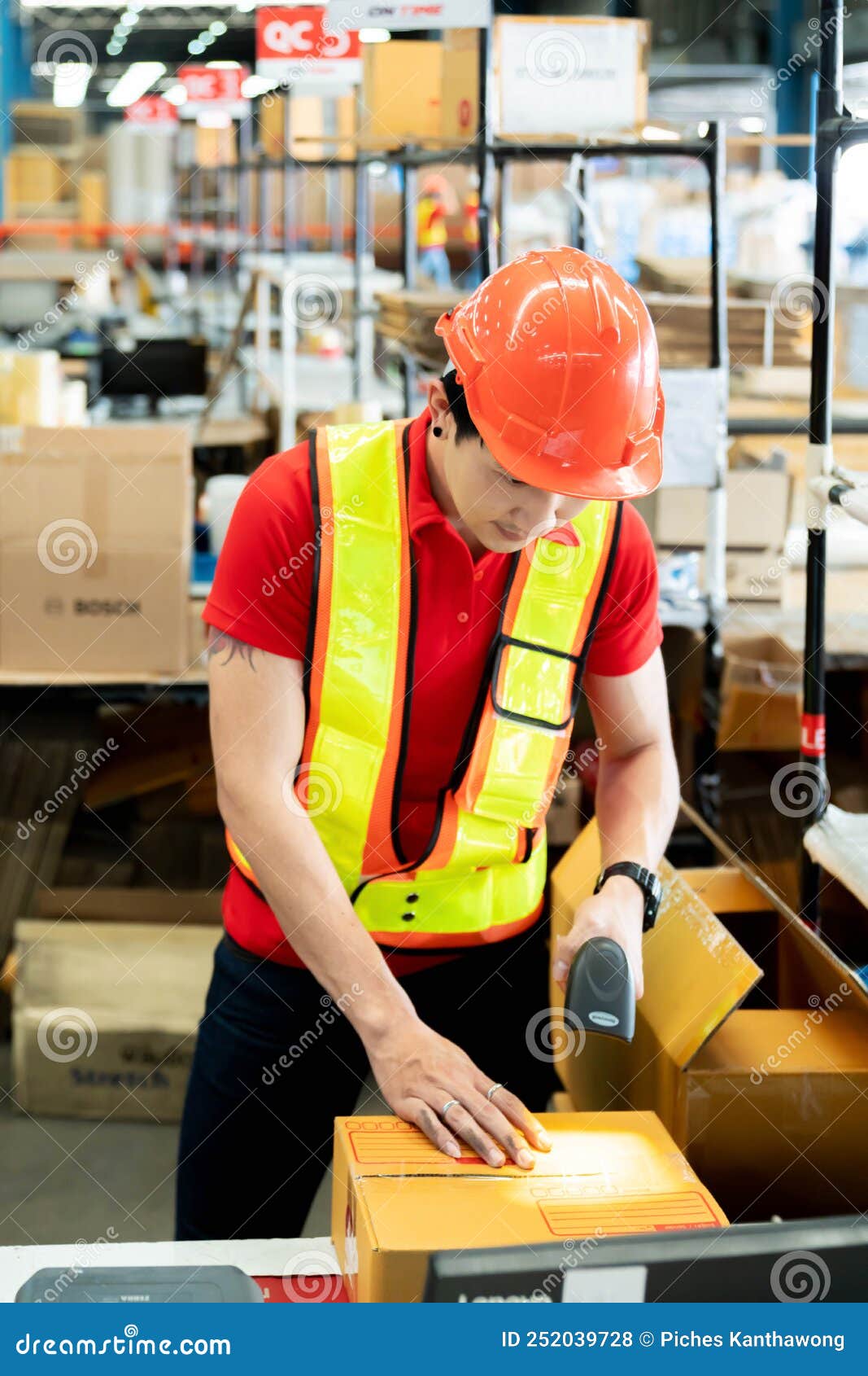 Worker Scanning Package in Warehouse for Shipping at Warehouse Factory ...