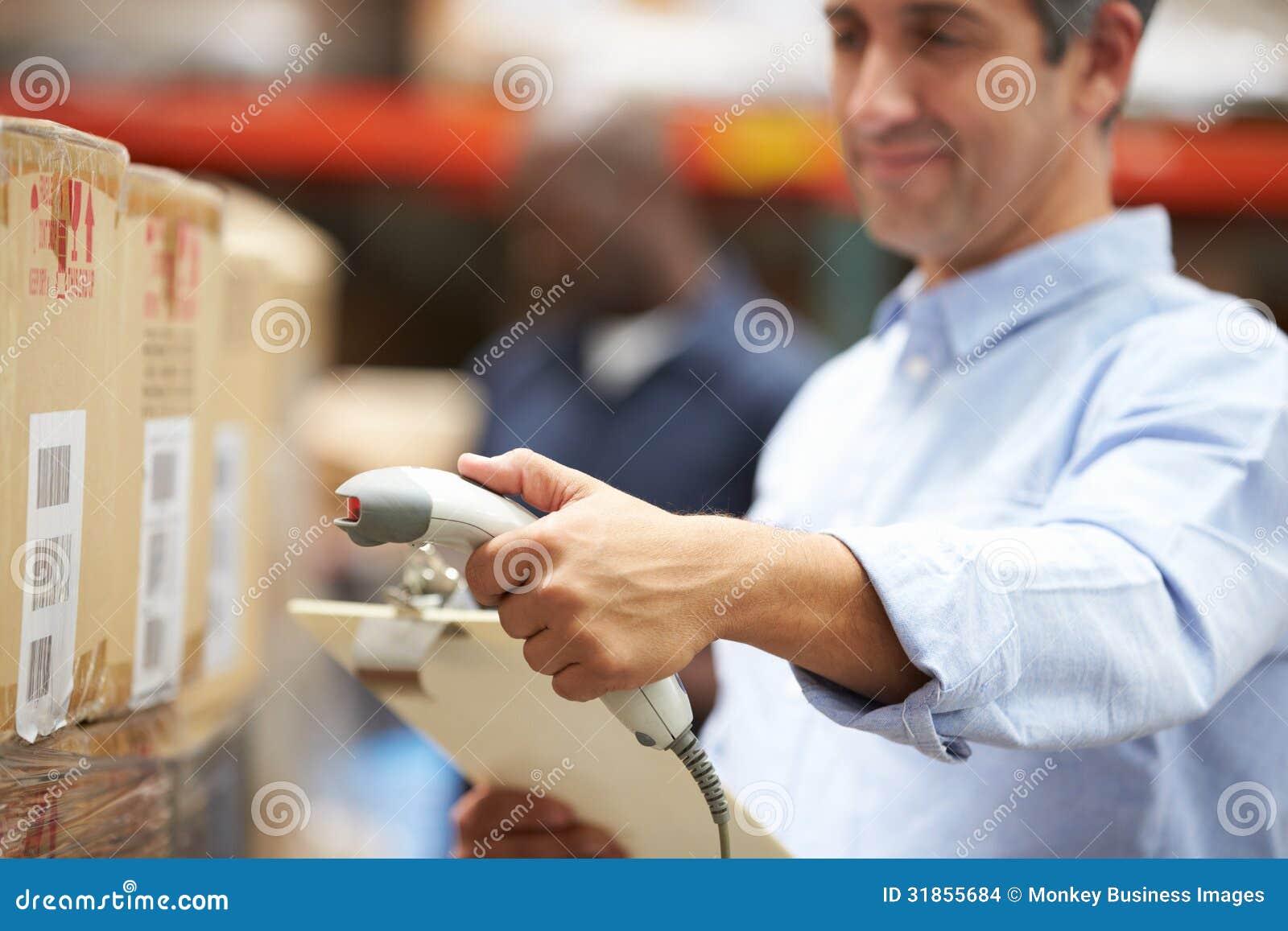 Worker Scanning Barcode Scanner On Package Boxes, Sorting Shipment ...