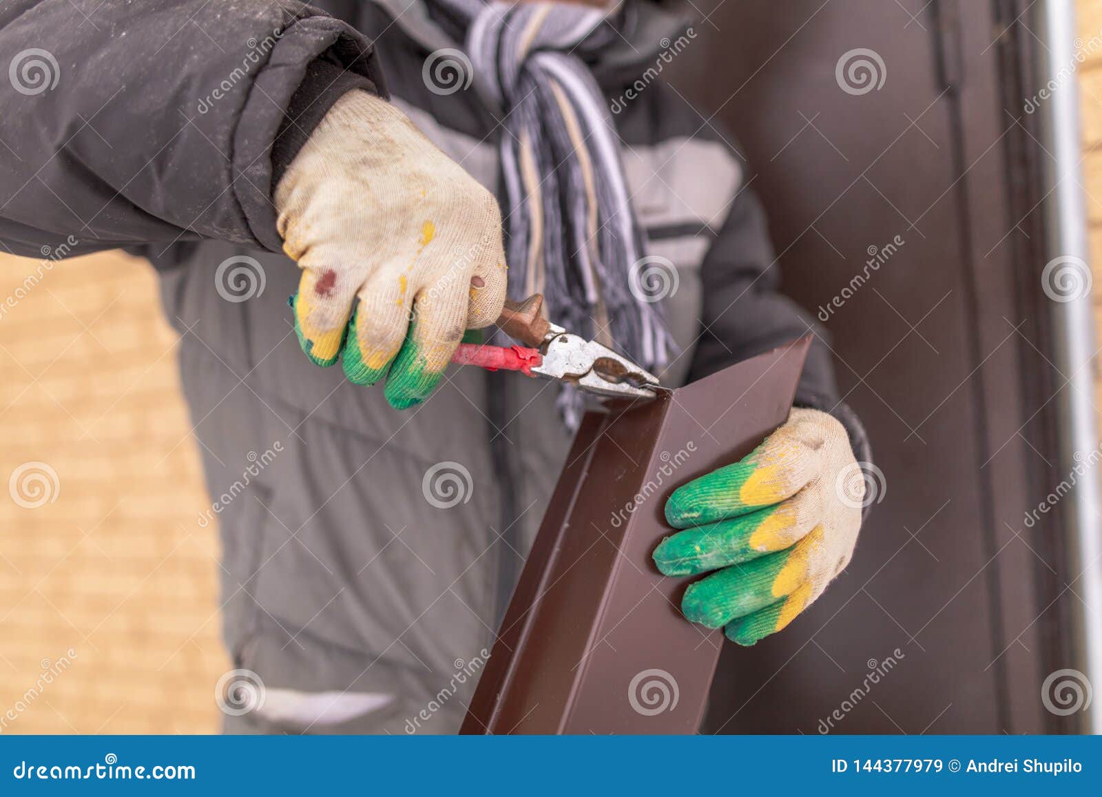 Worker Scissors Metal at a Construction Site Stock Image - Image of ...