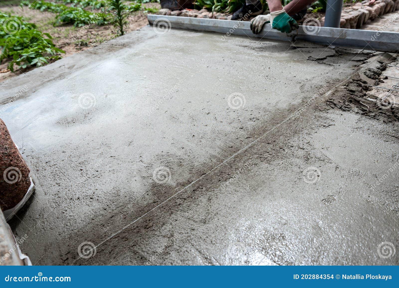 Worker Screeding Outdoor Cement Floor with Screed Stock Photo - Image ...