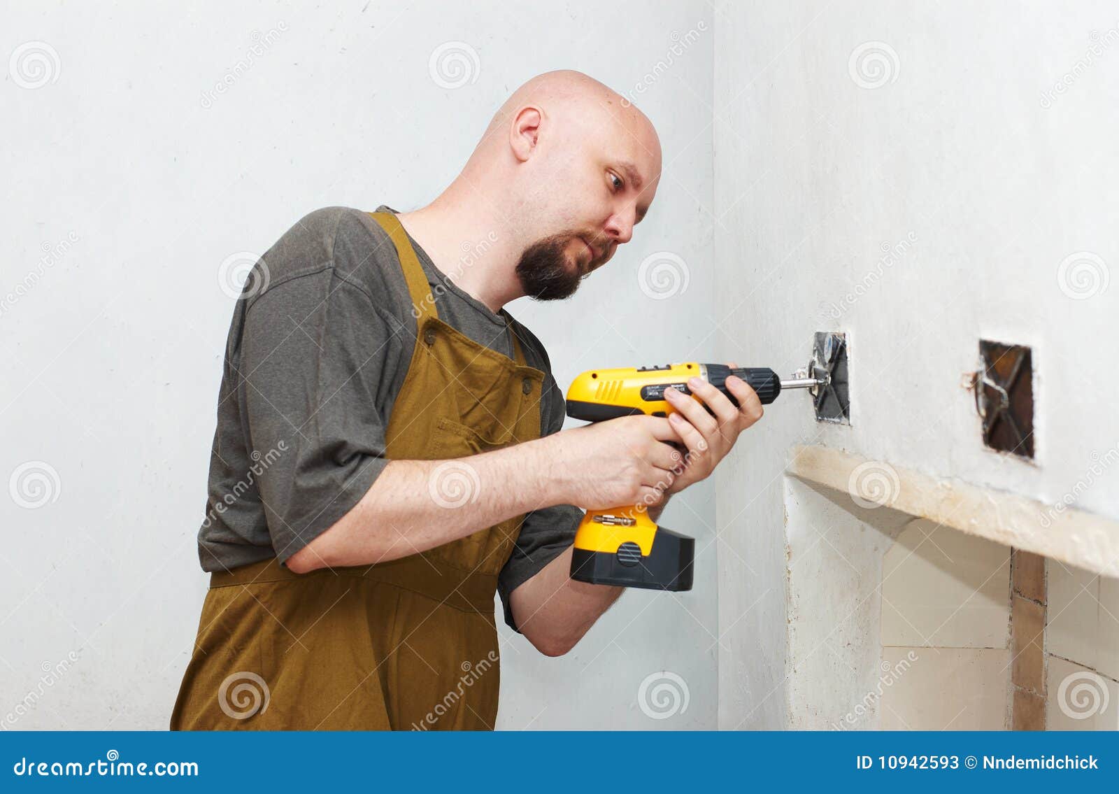 Worker with screwdriver stock image. Image of constructor - 10942593