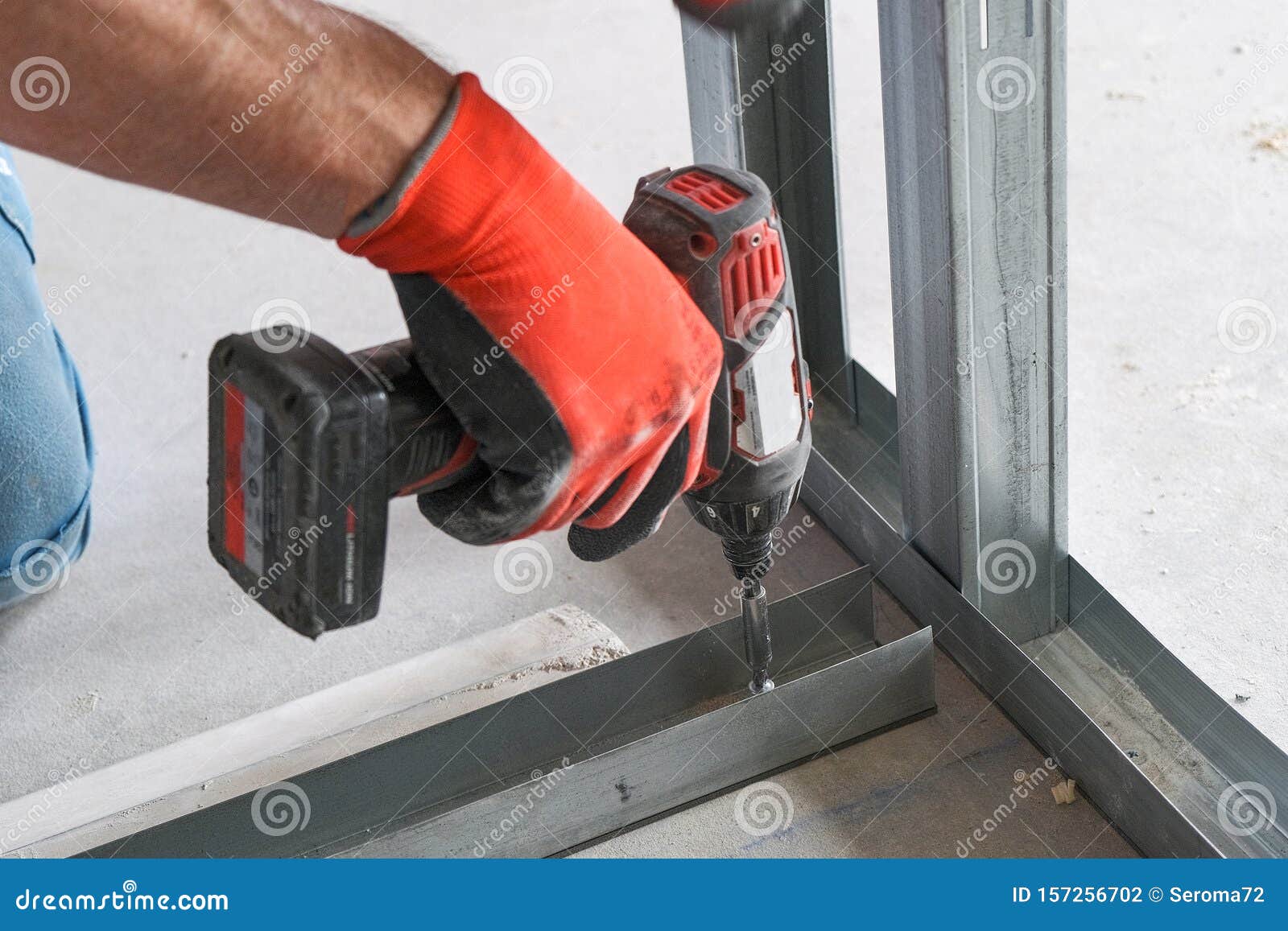 Worker Screws the into the Drywall Rack Stock Photo - Image of ...