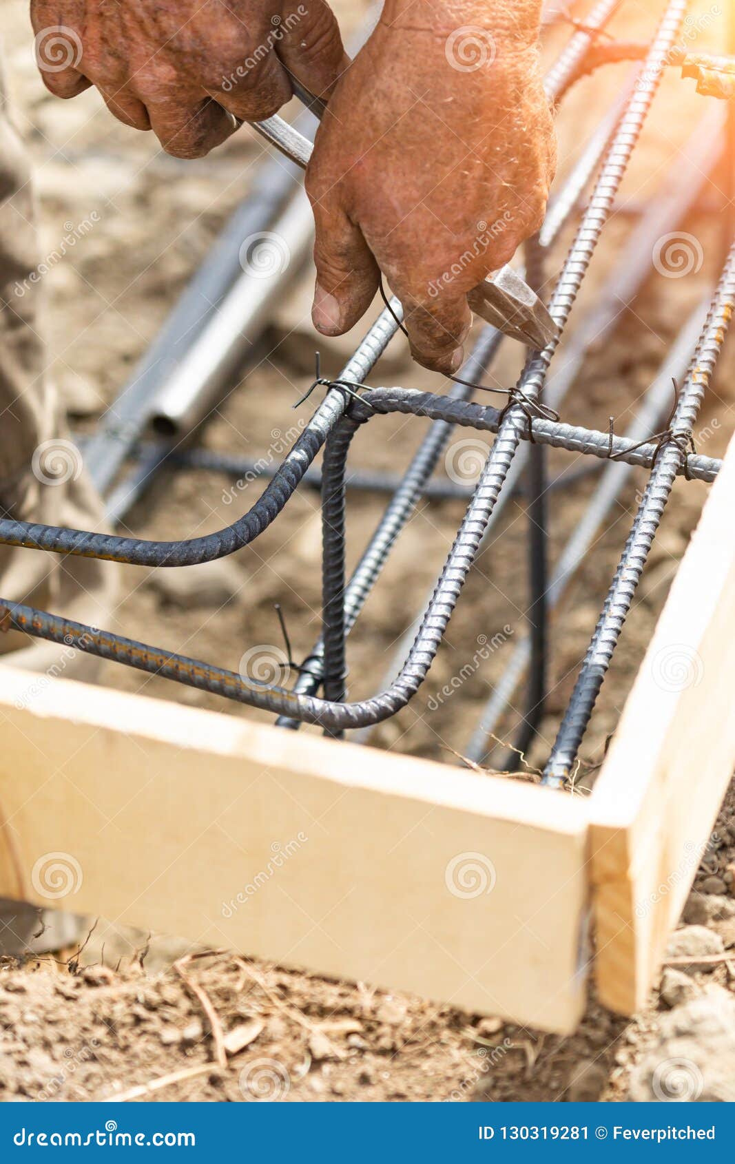 Worker Securing Steel Rebar Framing With Wire Plier Cutter Tool Stock ...