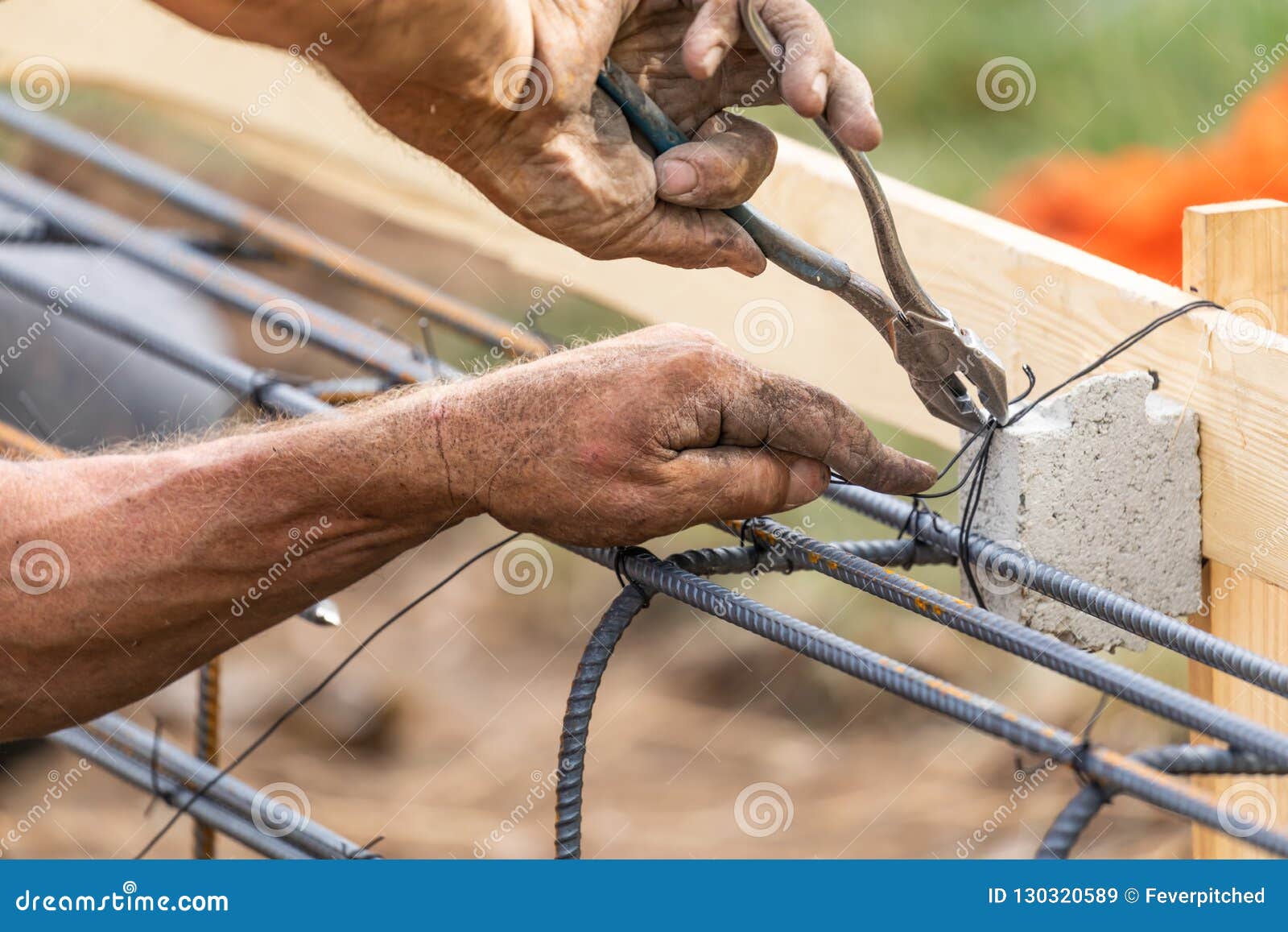 Worker Securing Steel Rebar Framing with Wire Plier Cutter Tool Stock ...