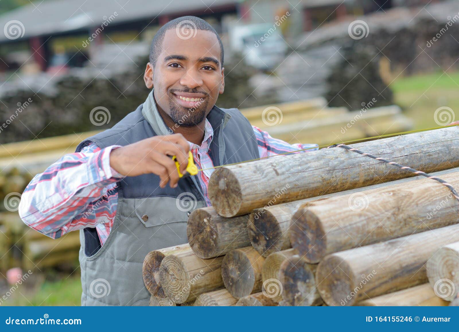 Worker securing timber stock photo. Image of paper, wood - 164155246