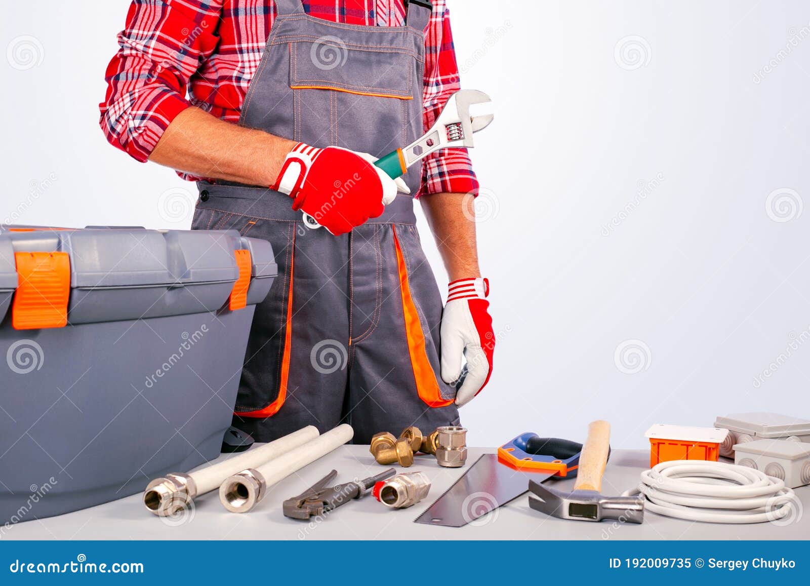 Worker, Service Man Holding Adjustable Wrench and Different Tools Stock ...