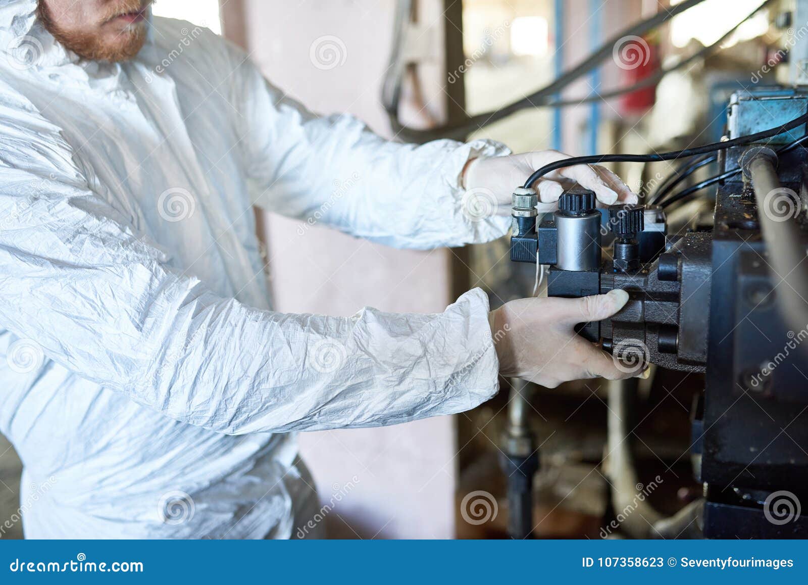 Worker Setting Up Machine on Biohazard Factory Stock Image - Image of ...