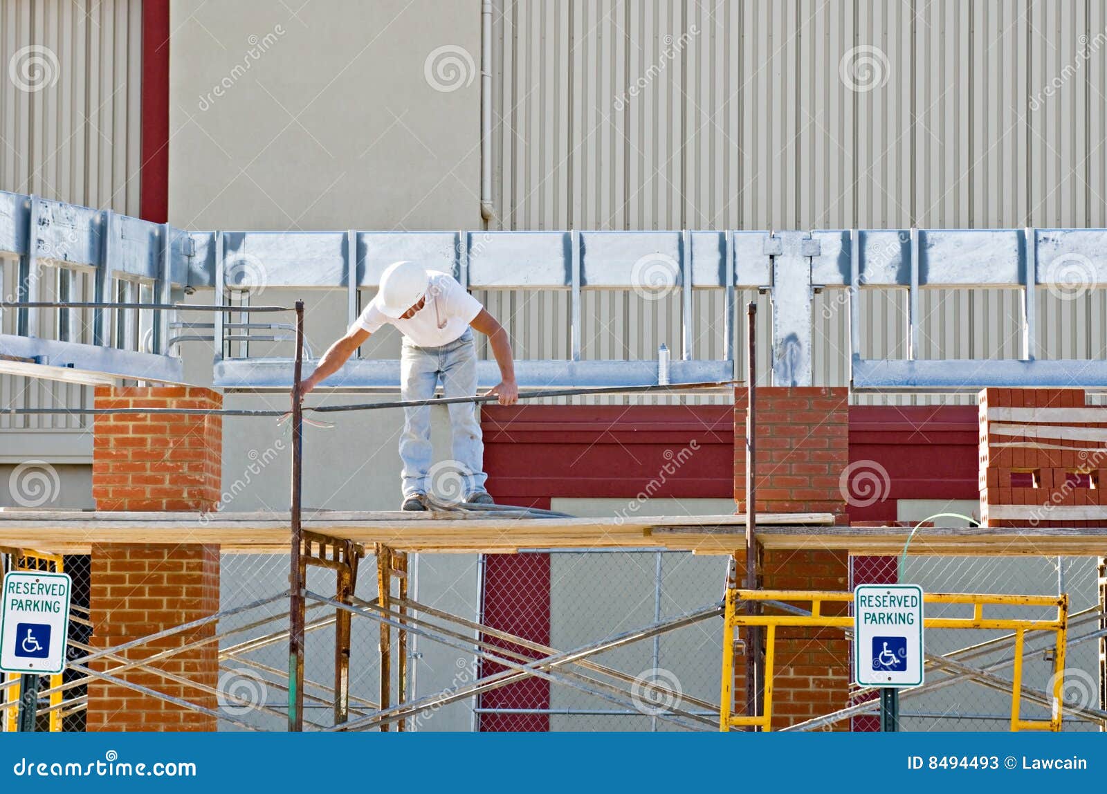 Worker Setting Up Scaffolding Stock Image - Image of bending ...