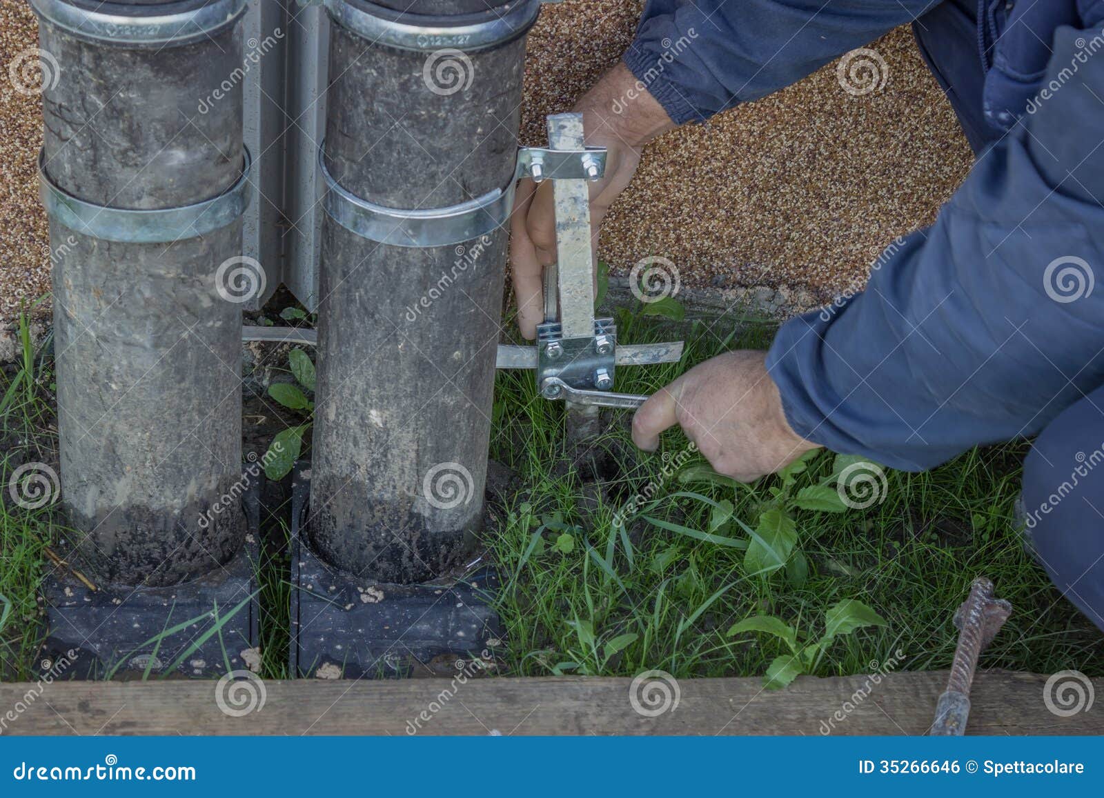 Worker Settings Gutter Grounding Clamp Stock Photo - Image of close ...