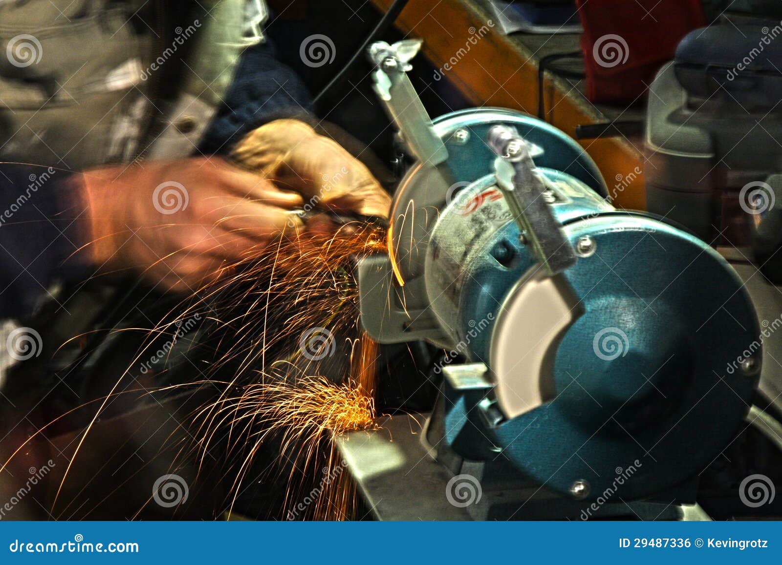 Man Sharpening Tool Instrument on a Grinder with Sparks Stock Photo ...