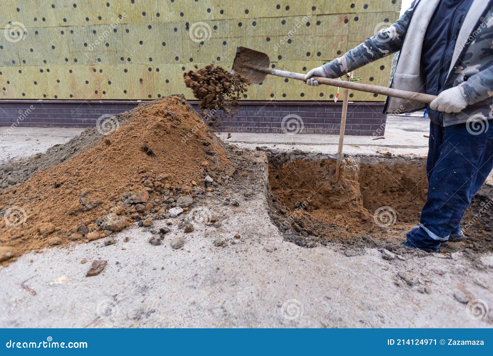Worker with Shovel is Digging a Pit on Construction Site. Concept of ...