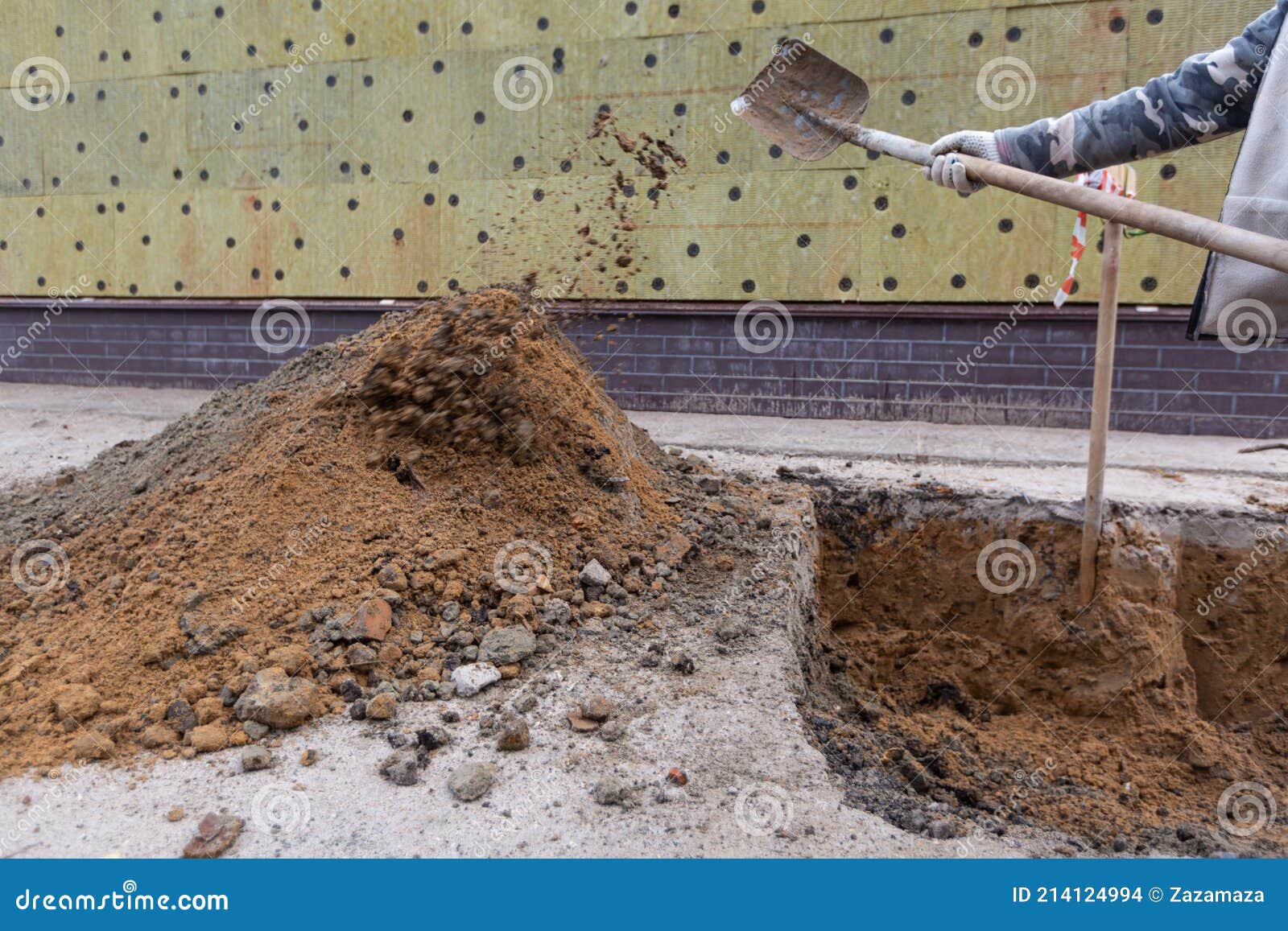 Worker with Shovel is Digging a Pit on Construction Site. Concept of ...