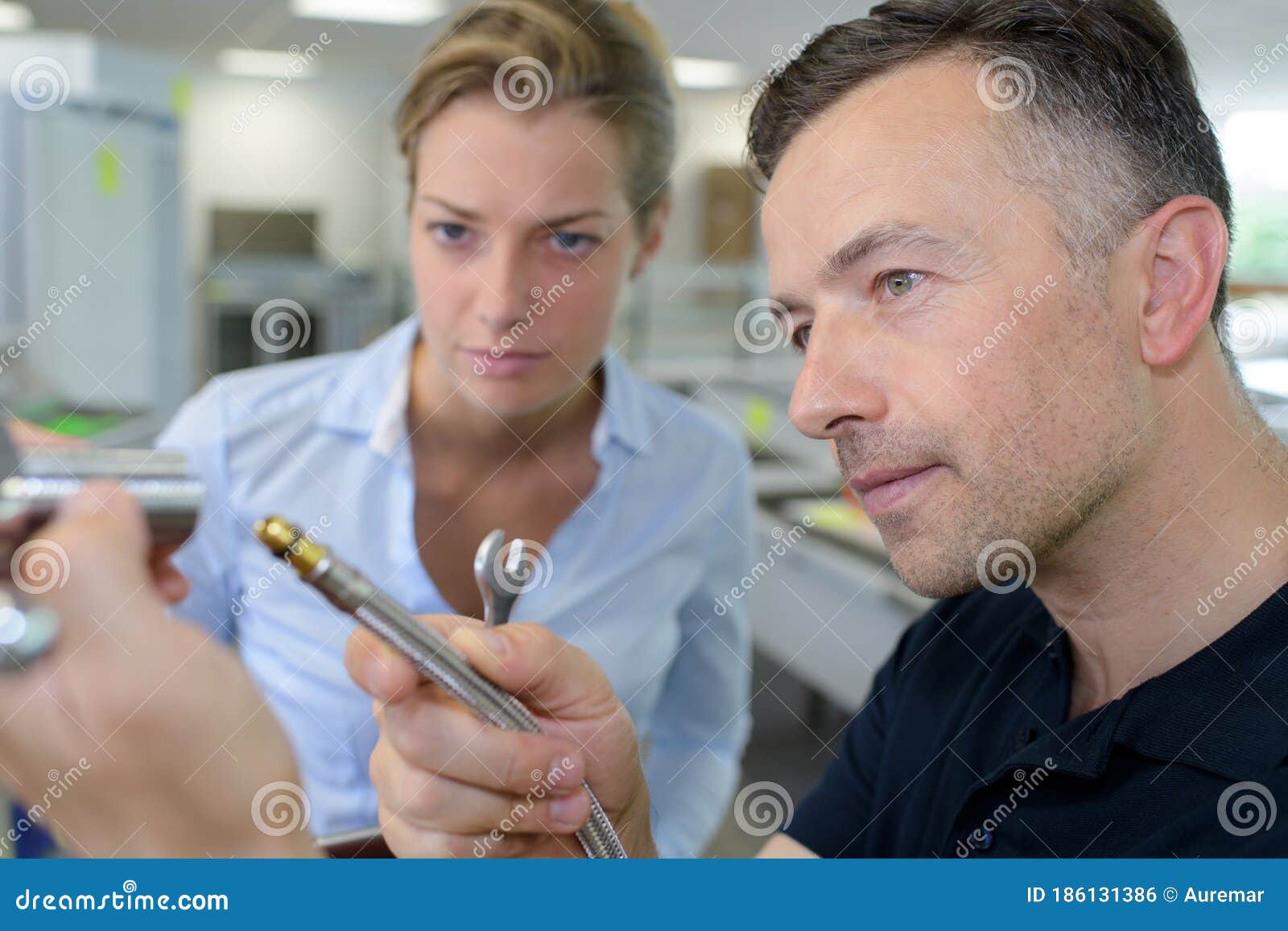 Worker Showing Customer Problems Stock Photo - Image of door, tool ...