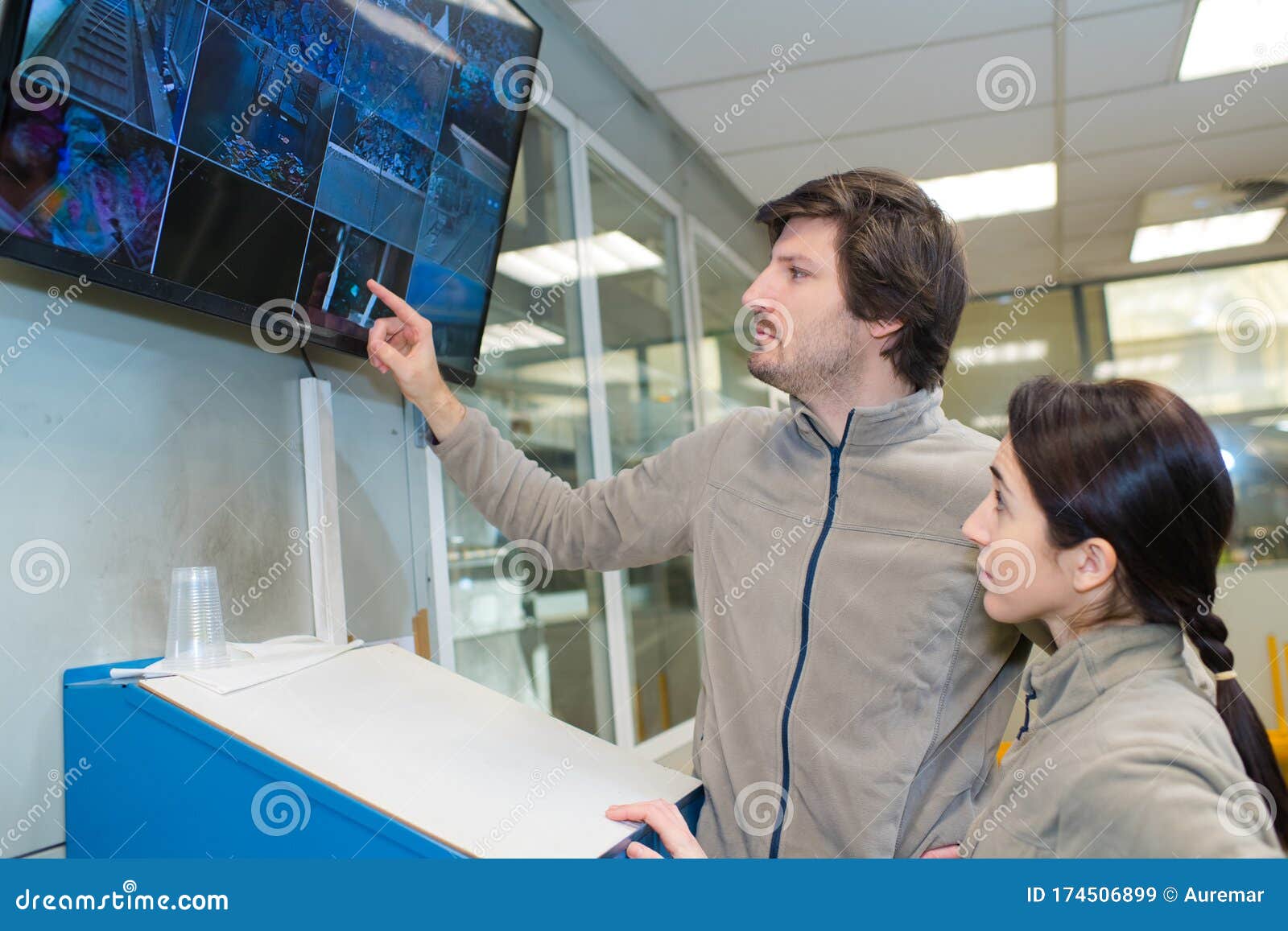 Worker Showing New Colleague Area on Cctv Screen Stock Image - Image of ...
