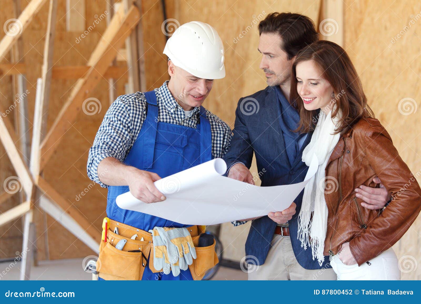 Worker Shows House Design Plans Stock Photo - Image of family, young ...