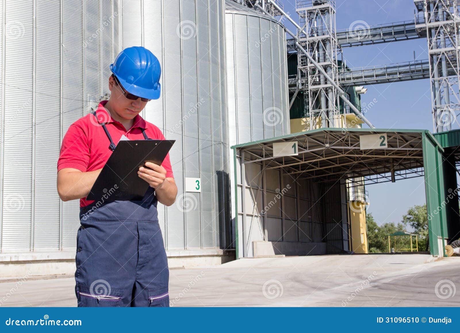 Worker in silo company stock photo. Image of engineer - 31096510