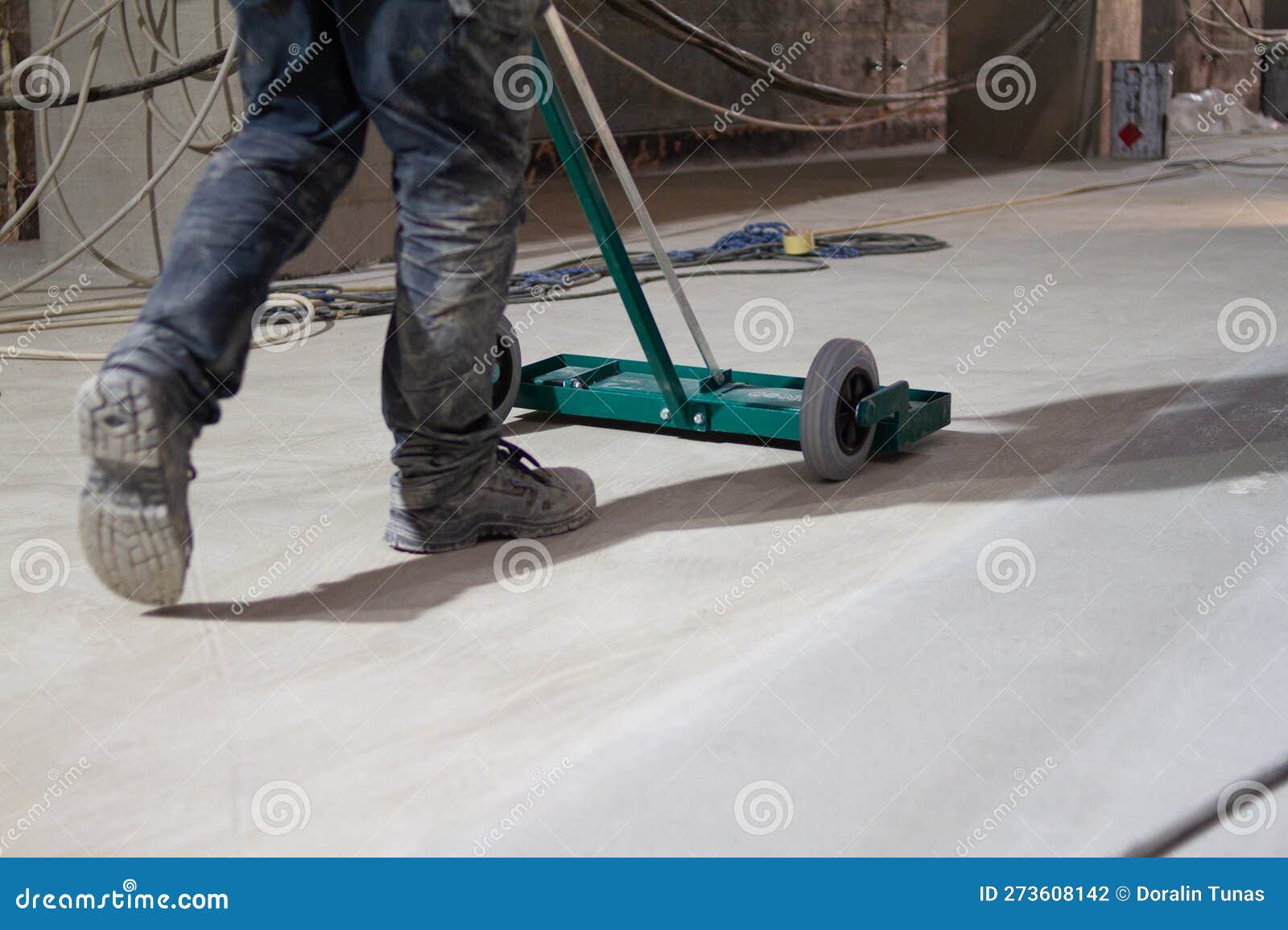 The Worker is Skillfully Using a Mechanical Brush To Clean and Polish ...