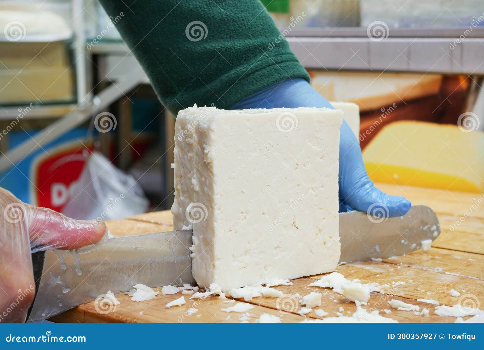 Worker Slicing the Cheese on Table , Stock Image - Image of knife ...