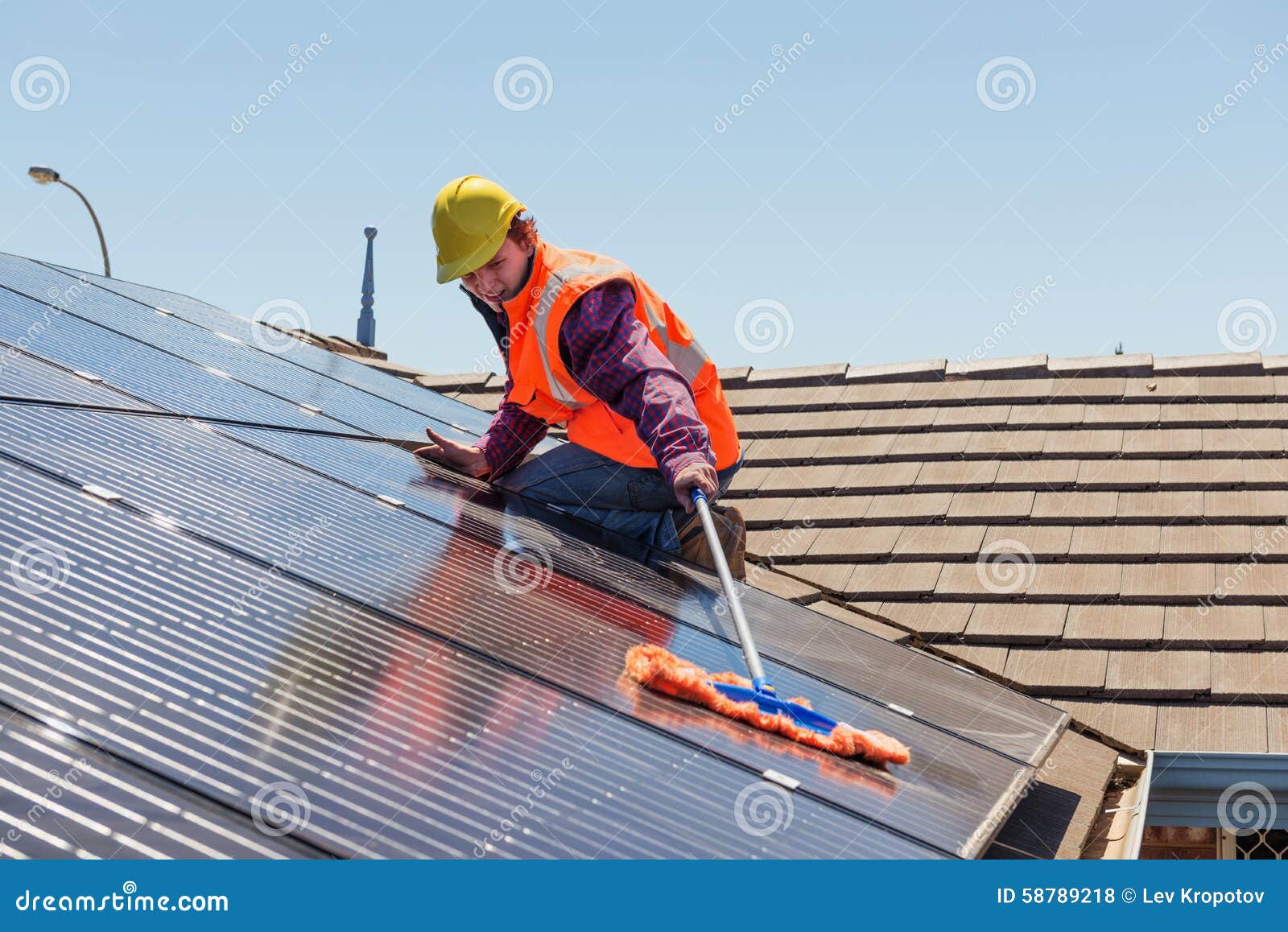 Worker and solar panels stock photo. Image of electric - 58789218