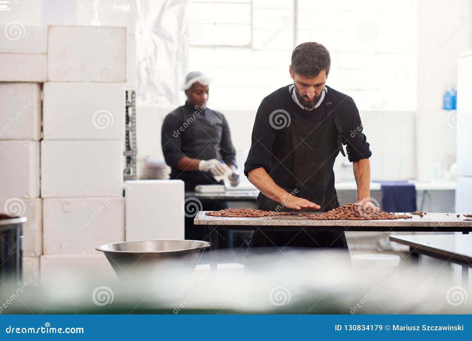 Worker Sorting Quality Cocao Beans for Chocolate Making Production ...