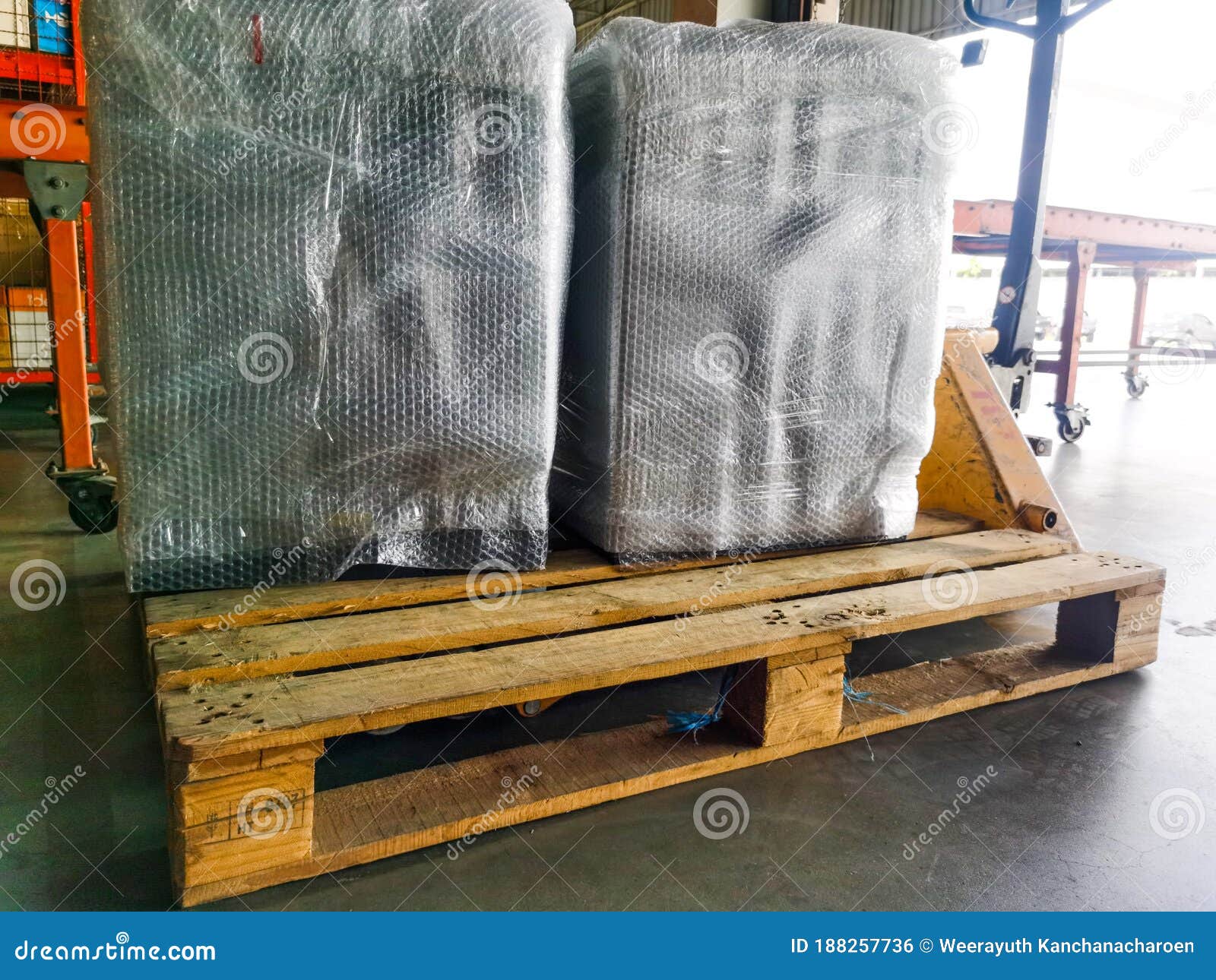 Worker Sorting Shipment And Package Box On Hand Lift Pallet In Cargo ...